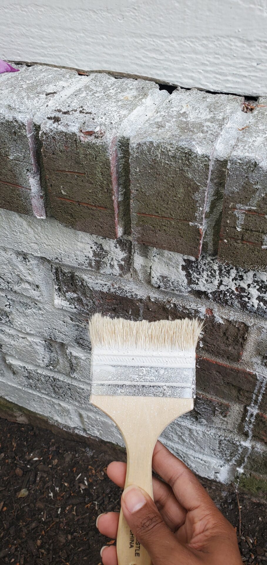 How to Whitewash Exterior Brick Easily - Design by Made In Casita